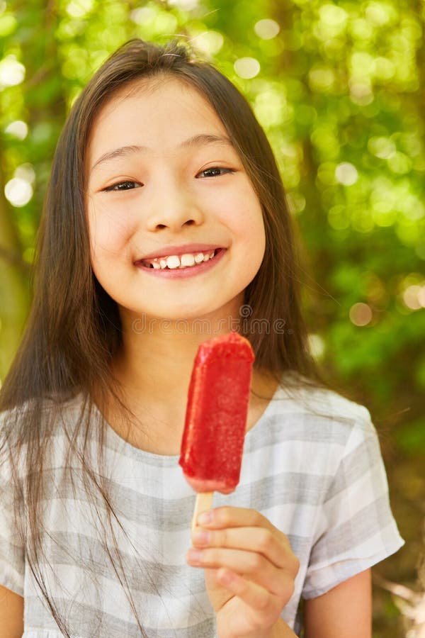 Asian Child Eating Popsicle Stock Photos - Free & Royalty-Free Stock ...