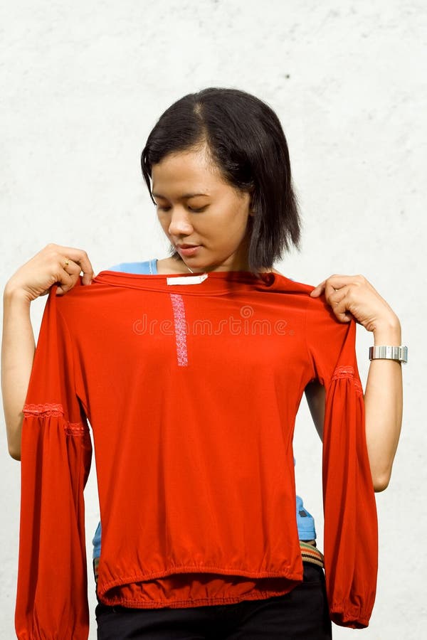 Happy Ethnic Girl Fitting an Outfit Stock Photo - Image of outfit ...