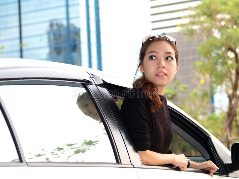 Asian Girl Looking at Back of Car Stock Photo - Image of people ...