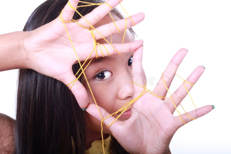 Asian Girl Looking through a Thread Stock Photo - Image of nasty, game ...