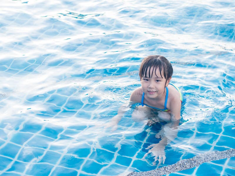 Asian Girl is Playing in the Pool Stock Image - Image of leisure ...