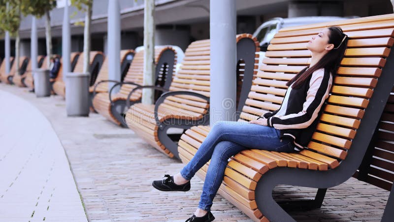 Asian Girl with a Pretty Face Sitting on a Bench Stock Video - Video of ...