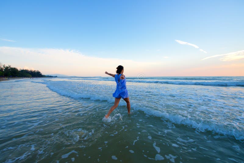 Asian Girl Running Toward Water Stock Image - Image of freedom, happy ...