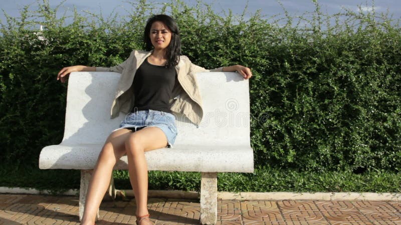 Asian Girl Sitting Bank Bench Alone Stock Video - Video of garden, body ...