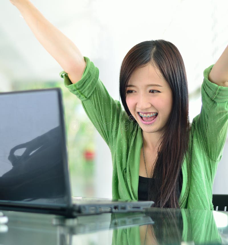 Asian Girl Smiling in Success Job Stock Photo - Image of desk, hand ...