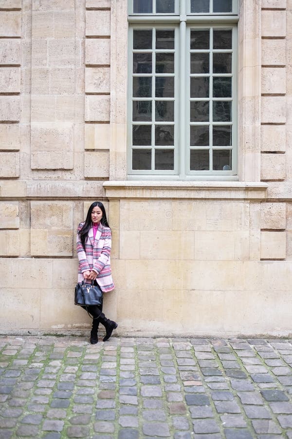 An Asian Girl Stands Alone on a Wall Stock Image - Image of asian ...