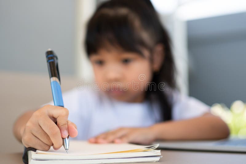 Asian Girl Student Holding a Pen for Taking Notes and Doing Homework ...