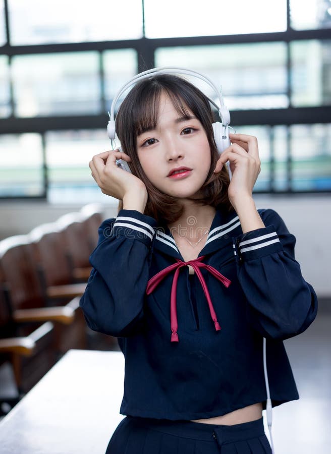 Asian Girl Student in School Uniform Learning in the Classroom Stock ...