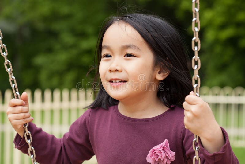 Asian Girl Swinging on a Swing Stock Image - Image of asian, laughing ...