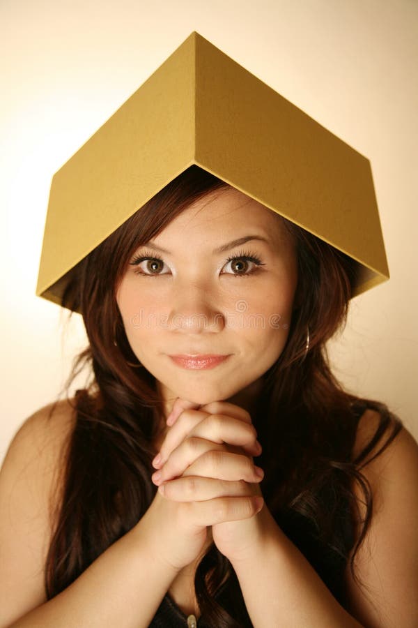 Asian girl wearing box stock image. Image of pose, asian - 2558143