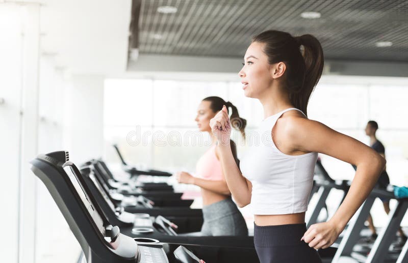 Asian Girl Working Out on Treadmill at the Gym Stock Photo - Image of ...