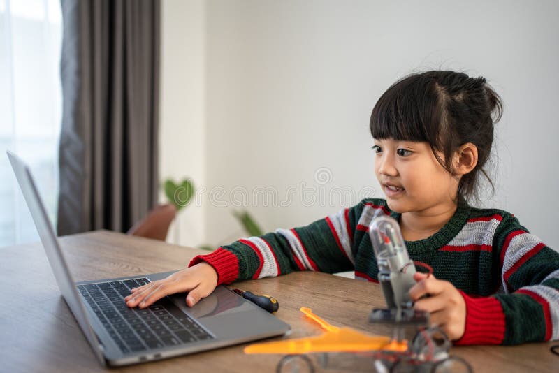 Asian Girls Enjoy Learning Online Tutor Training Course at Desk Table ...