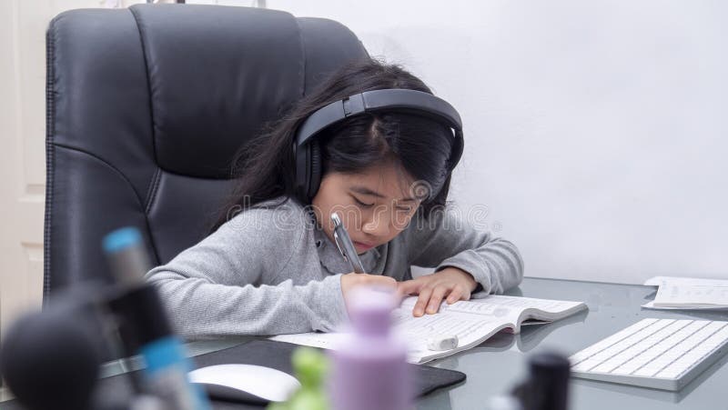 Asian Girls Study Online with Laptops. Kid Wear Headset Typing Keyboard ...