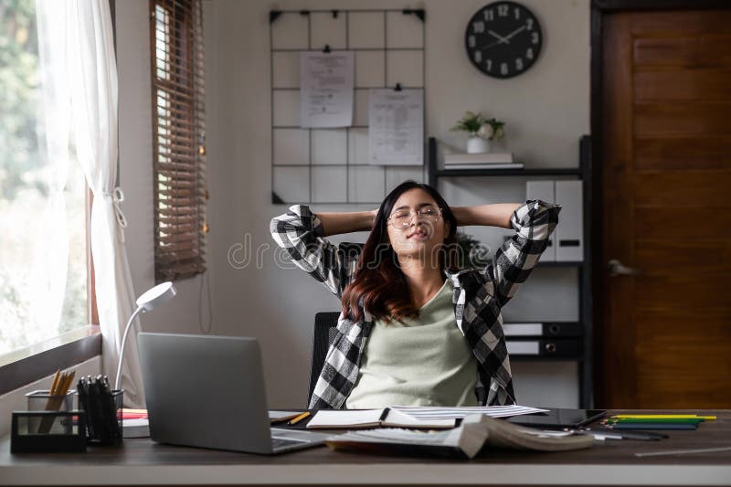 Asian Graphic Designer Resting Her Eyes during Work. Stock Image ...