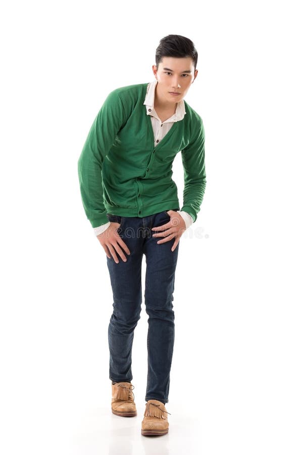 Asian Guy with Dramatic Pose Stock Image - Image of handsome, green ...