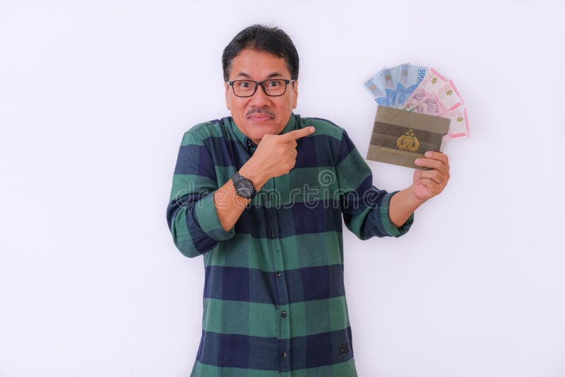 An Asian Guy Standing and Showing Some Money and His Car Ownership ...