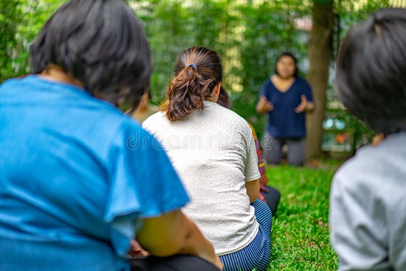 Asian Guys in the Garden Workshop and Have Acted Together Editorial ...