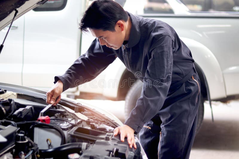 Asian Handsome Mechanic Man in Uniform Working with Engine Vehicle ...
