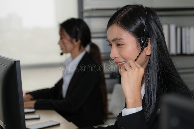 Asian Help Desk and Call Center Agent Working at Customer Service ...