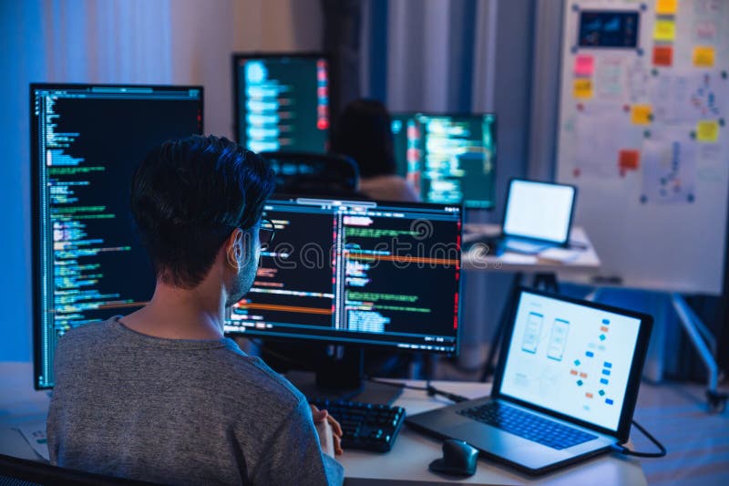 Asian And Indian Developer Devops Team Working About Coding Promgram With Software Computer At