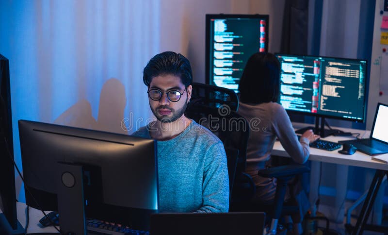 Asian And Indian Developer Devops Team Working About Coding Promgram With Software Computer At