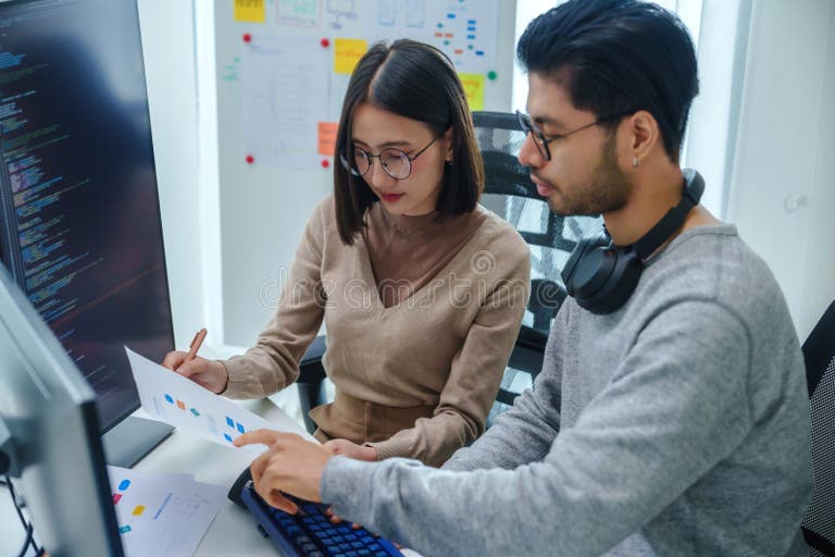 Asian and Indian Developer Team Discussion Feedback Analysis Coding Data with Software Computer ...