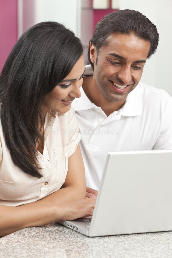 Asian Indian Man & Woman Couple Using Laptop Stock Image - Image of ...