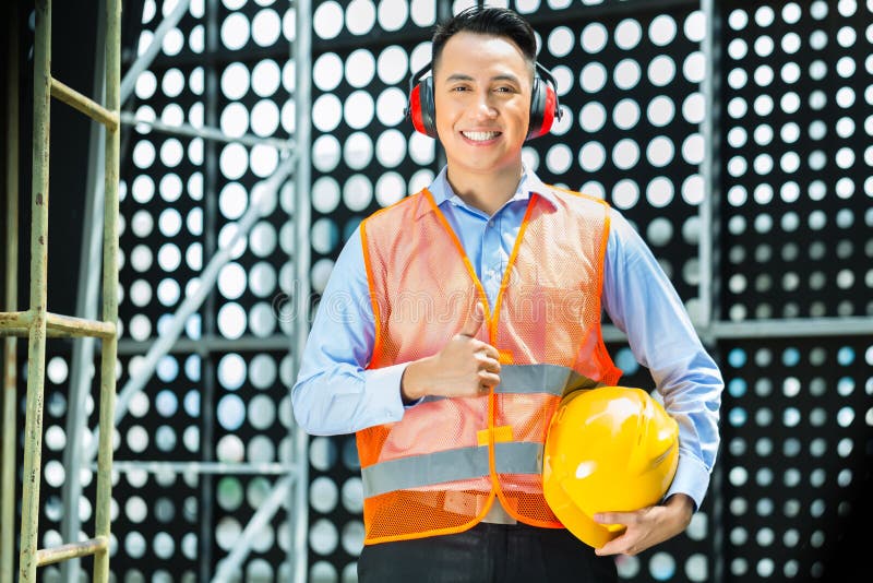 Asian Indonesian Construction Workers on Building Site Stock Image ...