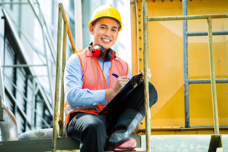 Asian Indonesian Construction Workers on Building Site Stock Image ...