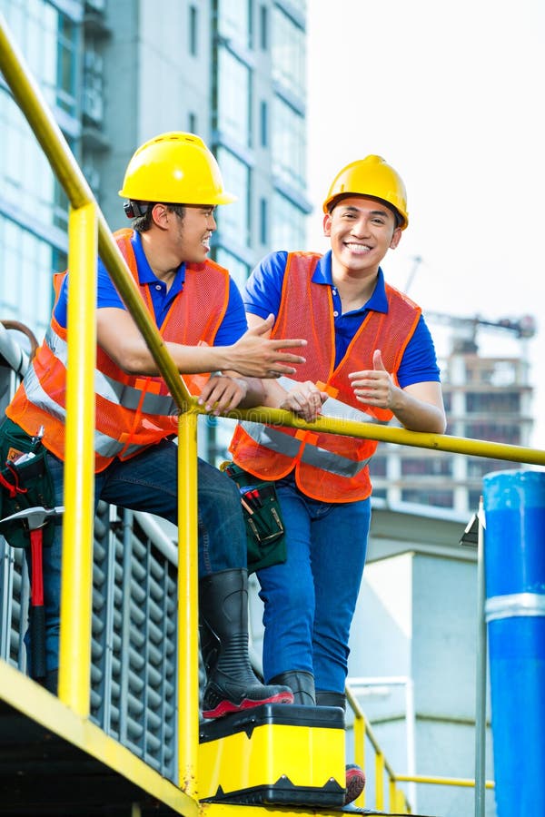Asian Indonesian Construction Workers on Building Site Stock Image ...