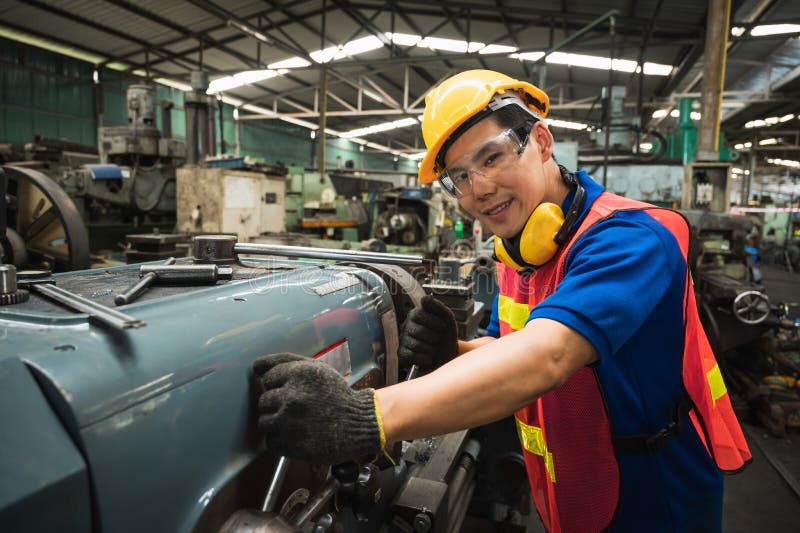 Asian Industrial Workers are Working on Projects in Large Industrial ...