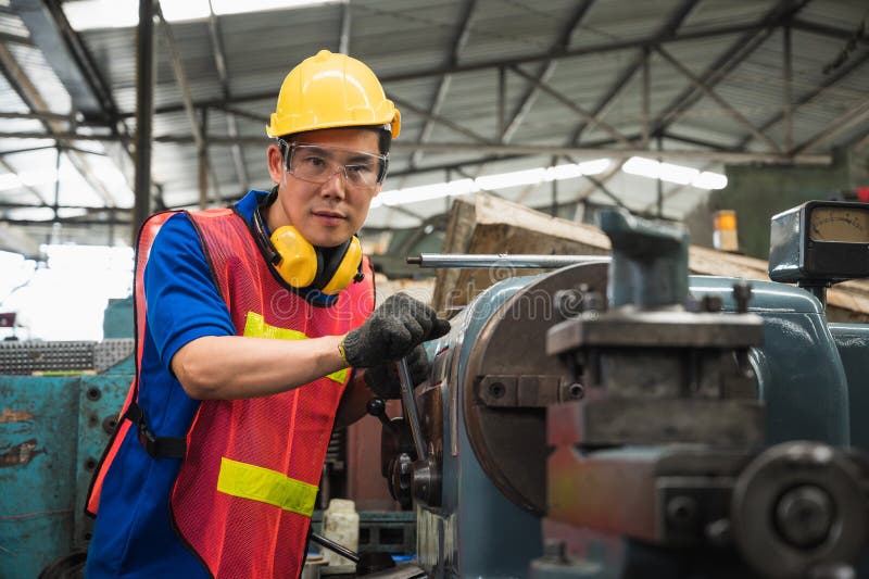 Asian Industrial Workers are Working on Projects in Large Industrial ...