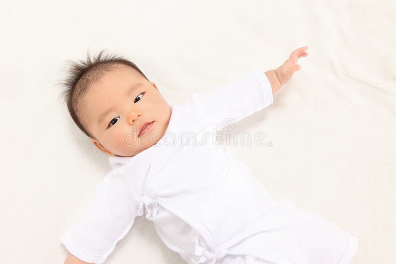 Chinese baby face smirking stock photo. Image of looking - 19376676