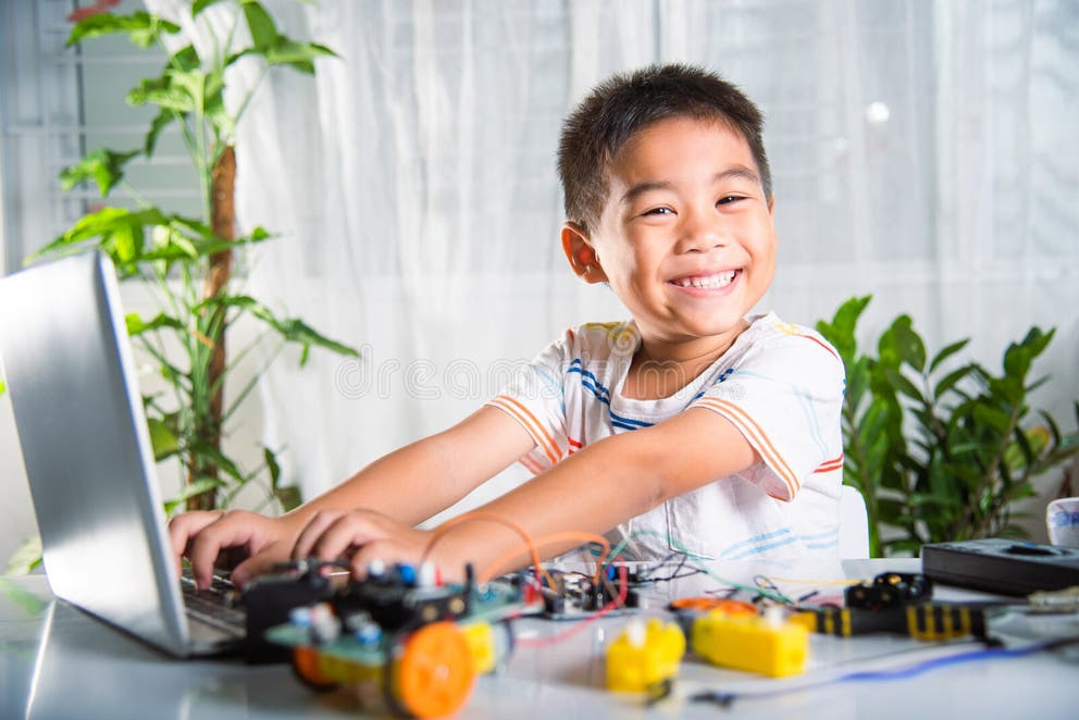 Asian Kid Boy Learns Coding and Programming with Laptop for Arduino Robot Car Stock Photo ...
