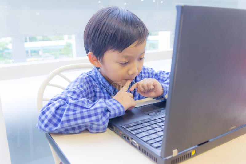 Asian kid with laptop stock image. Image of network, bright - 39572987