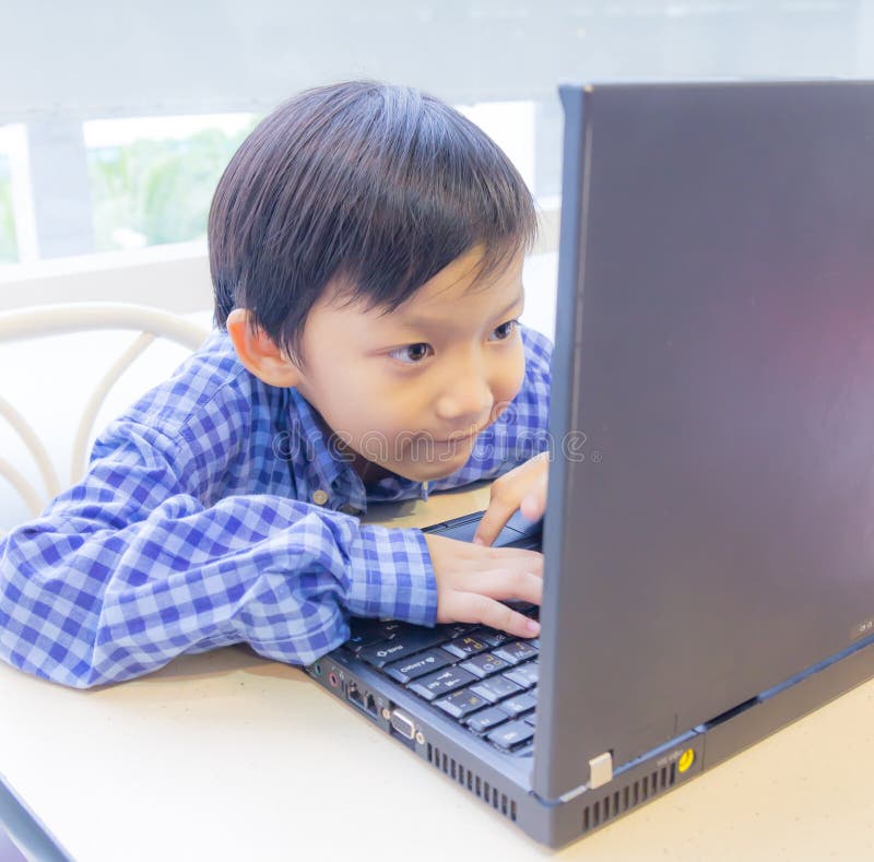 Asian kid with laptop stock photo. Image of female, mail - 39573000