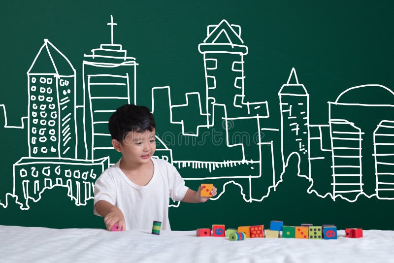 Asian Kid Learning by Playing with His Imagination about Building and ...