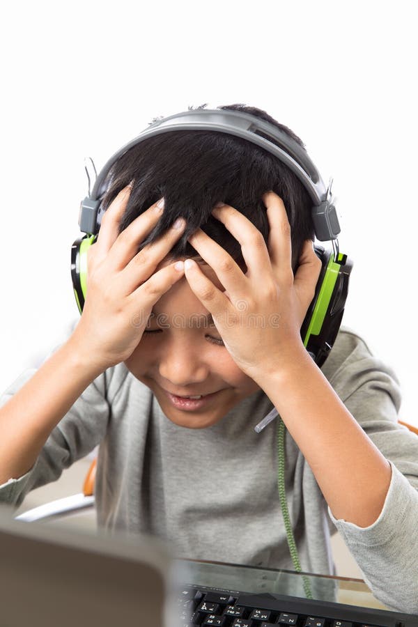 Asian Kid Play Computer Games with Yelling Face Stock Photo - Image of ...