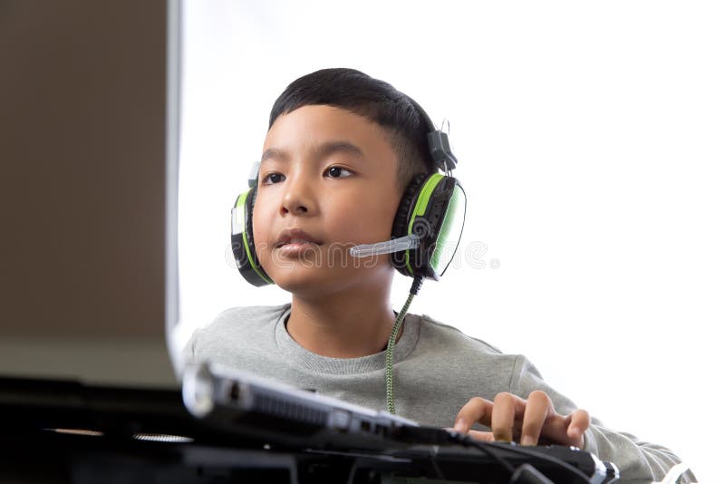 Asian Kid Play Computer Games Stock Image - Image of student, person ...