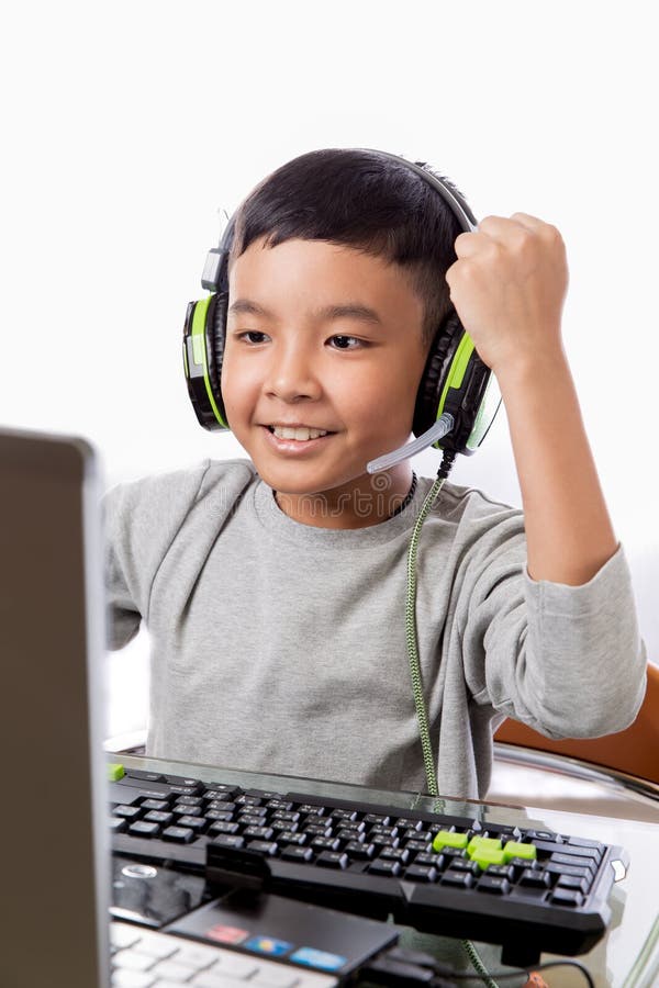 Asian Kid Play Computer Games with Victory Gesture Stock Image - Image ...