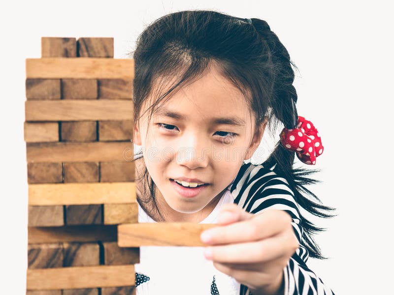 Asian Kid is Playing Wood Blocks Tower Game Stock Image - Image of ...