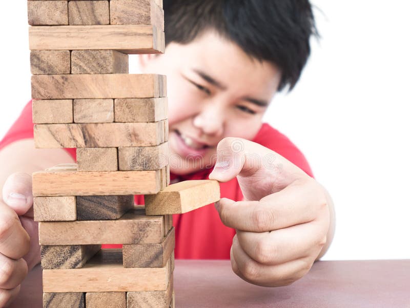 Asian Kid is Playing a Wood Blocks Tower Game Stock Photo - Image of ...