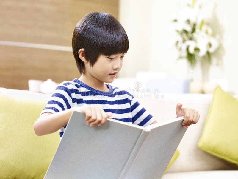Asian Little Boy Reading Book at Home Stock Photo - Image of japanese ...
