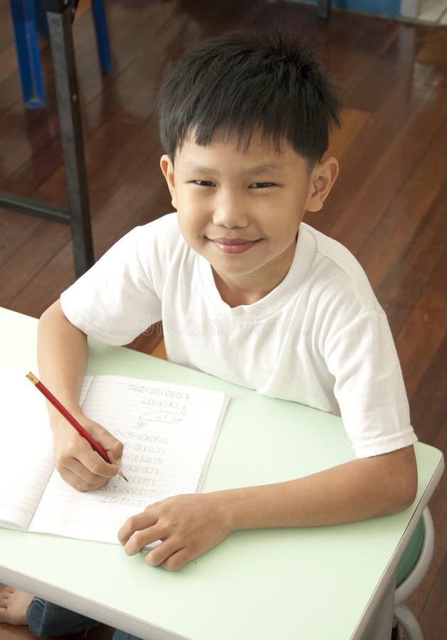 Asian Kid Smile in Class Room Stock Photo - Image of desk, face: 23303660