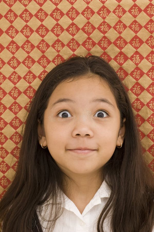Asian Kid with Surprised Expression Stock Image - Image of raised ...