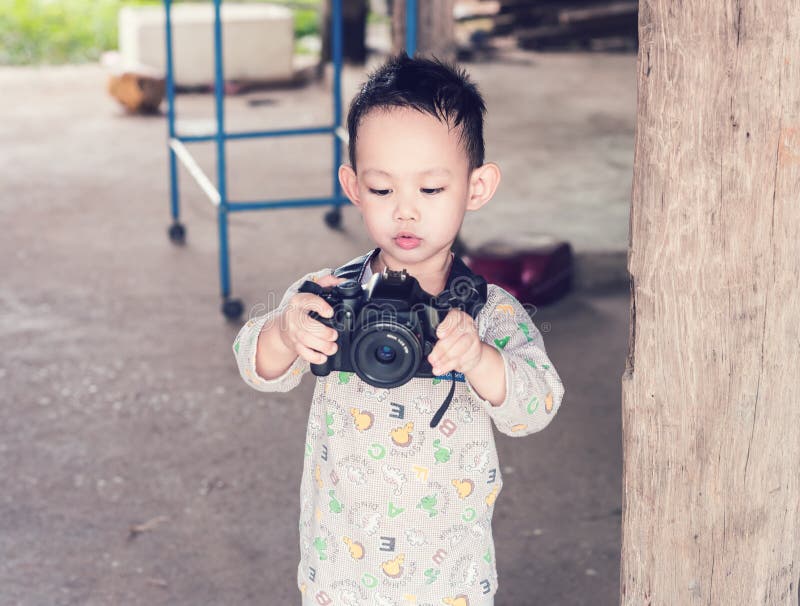 Asian Kid Take a Photo by DSLR Camera Stock Image - Image of happy ...