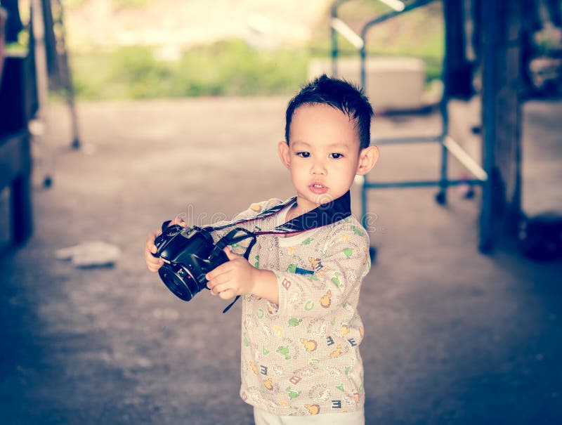 Asian Kid Take a Photo by DSLR Camera Stock Photo - Image of young ...