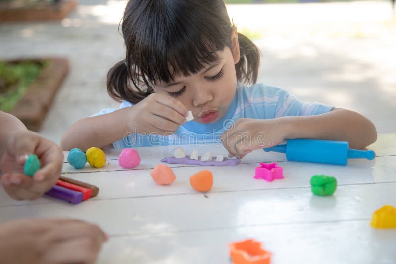 Asian Kids Play with Clay Molding Shapes, Learning through Play Stock ...