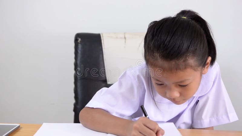 Asian Kids - Thai Girl in Student Uniform Writing Notebook Stock Video ...