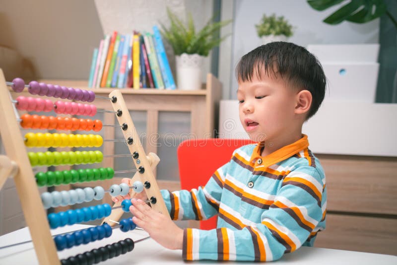 Asian Boy Learning and Studying the Work of Technology Robots ...